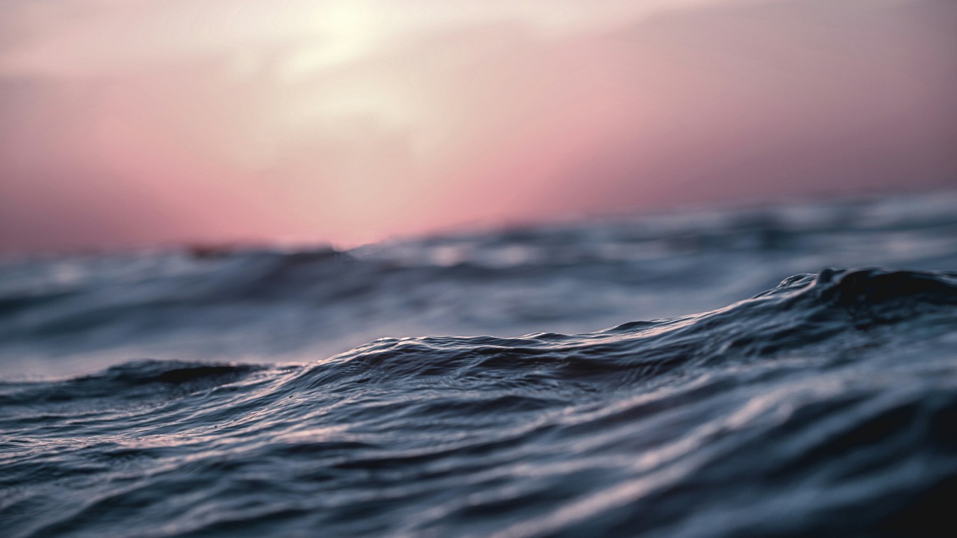 Sunset Over Ocean Waves Wallpaper - 1366x768